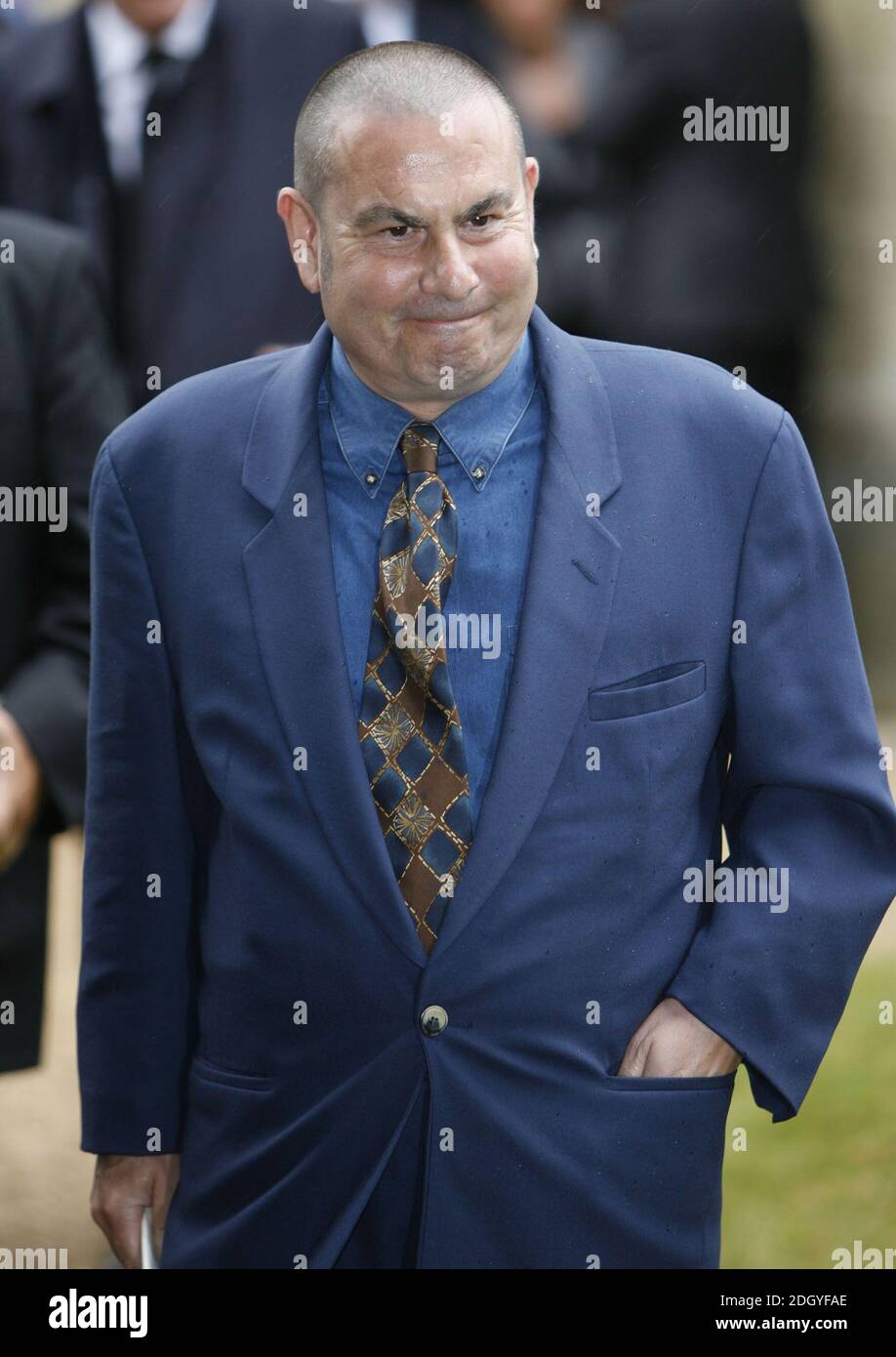 Eric Hall arriving at the funeral of Mike Reid, held at the Little ...
