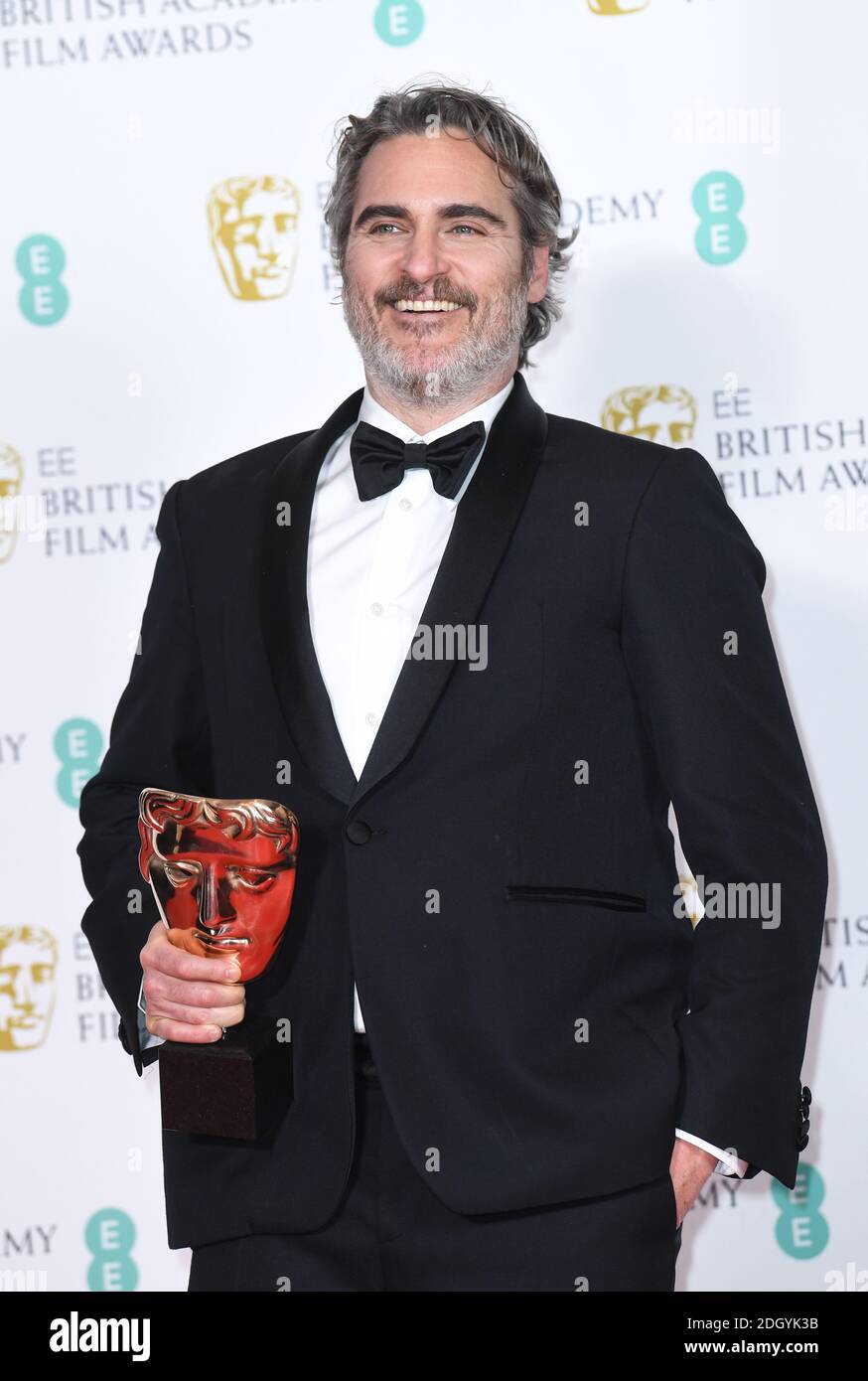 Joaquin Phoenix with his award for Best Actor at the 73rd British ...