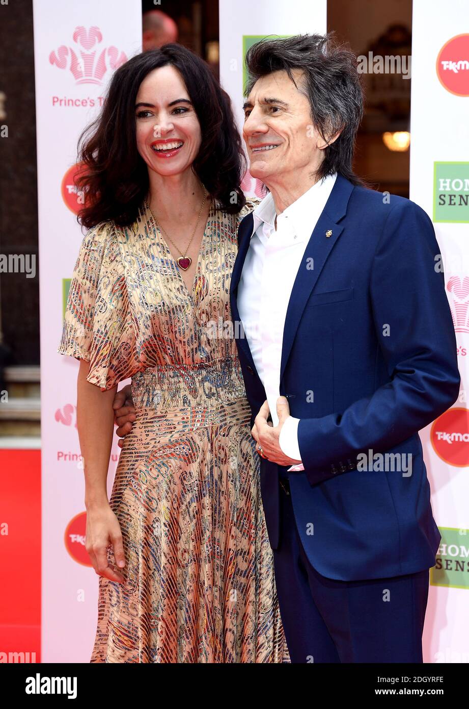 Ronnie Wood (right) and Sally Humphreys arriving at The Prince's Trust ...
