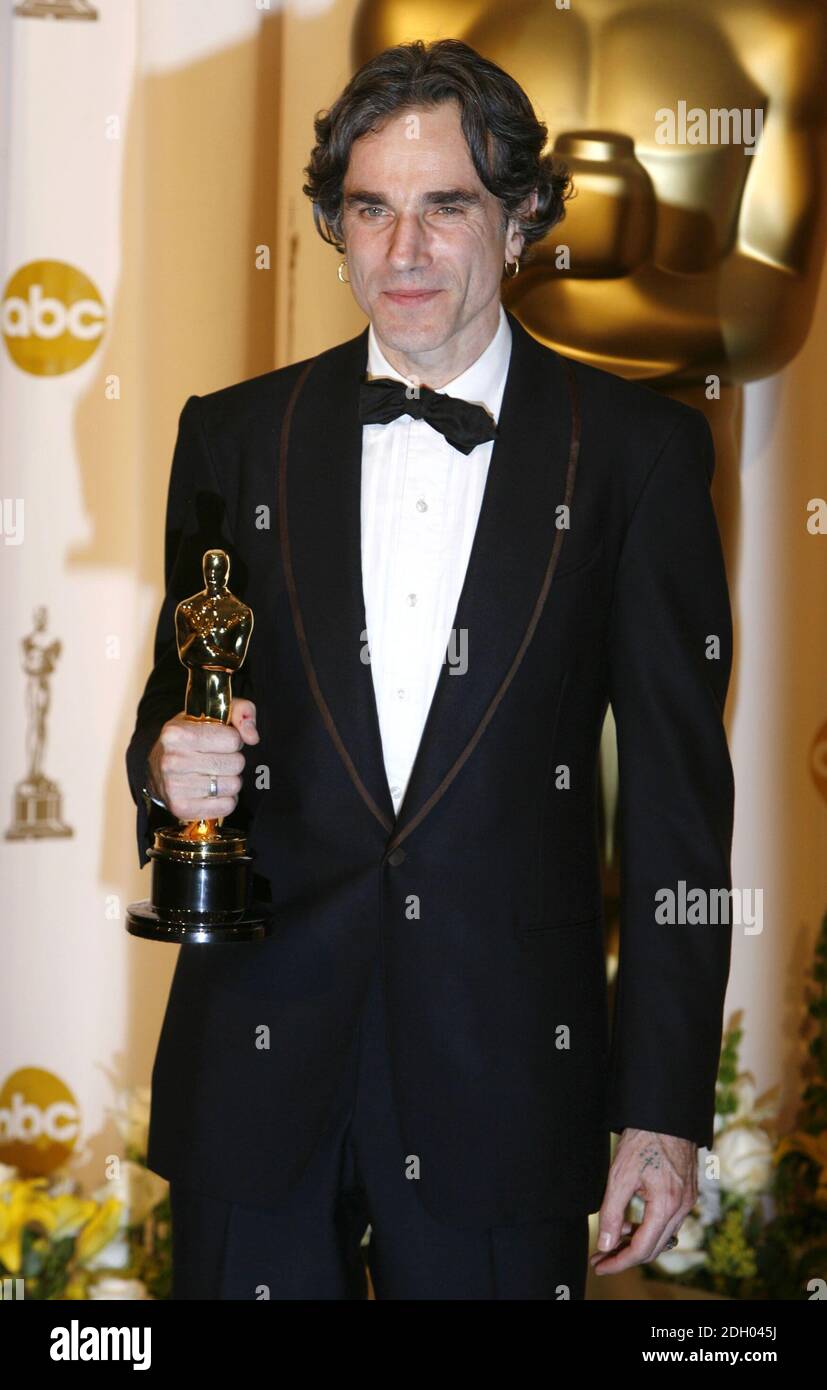 Daniel Day Lewis with the award for Best Actor received for There Will ...