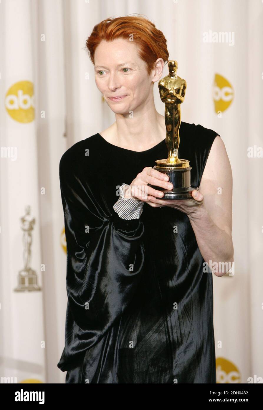 Tilda Swinton with the award for Actress in a Supporting Role received ...