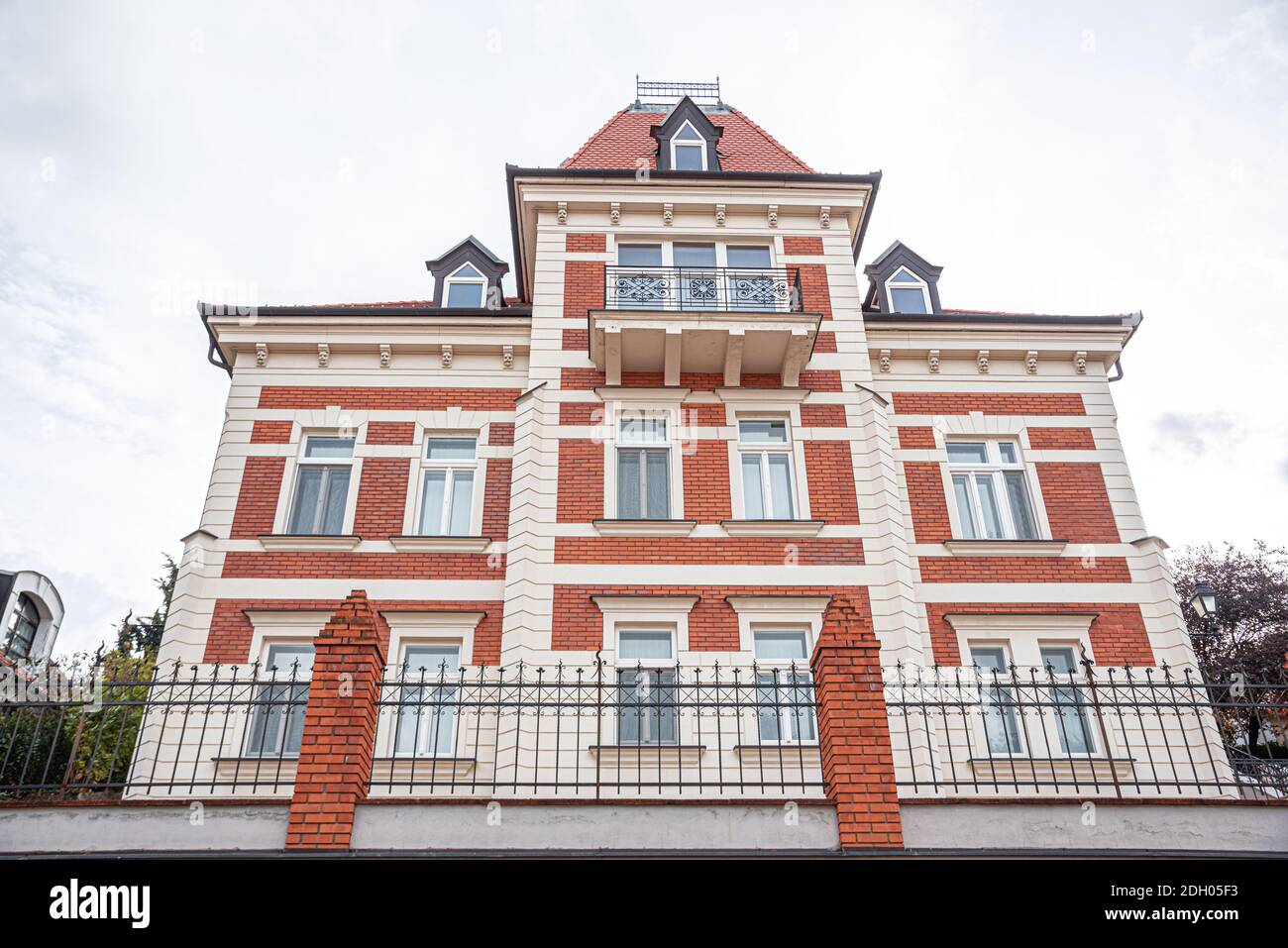 Red brick house on a street in Budapest, Hungary Stock Photo - Alamy
