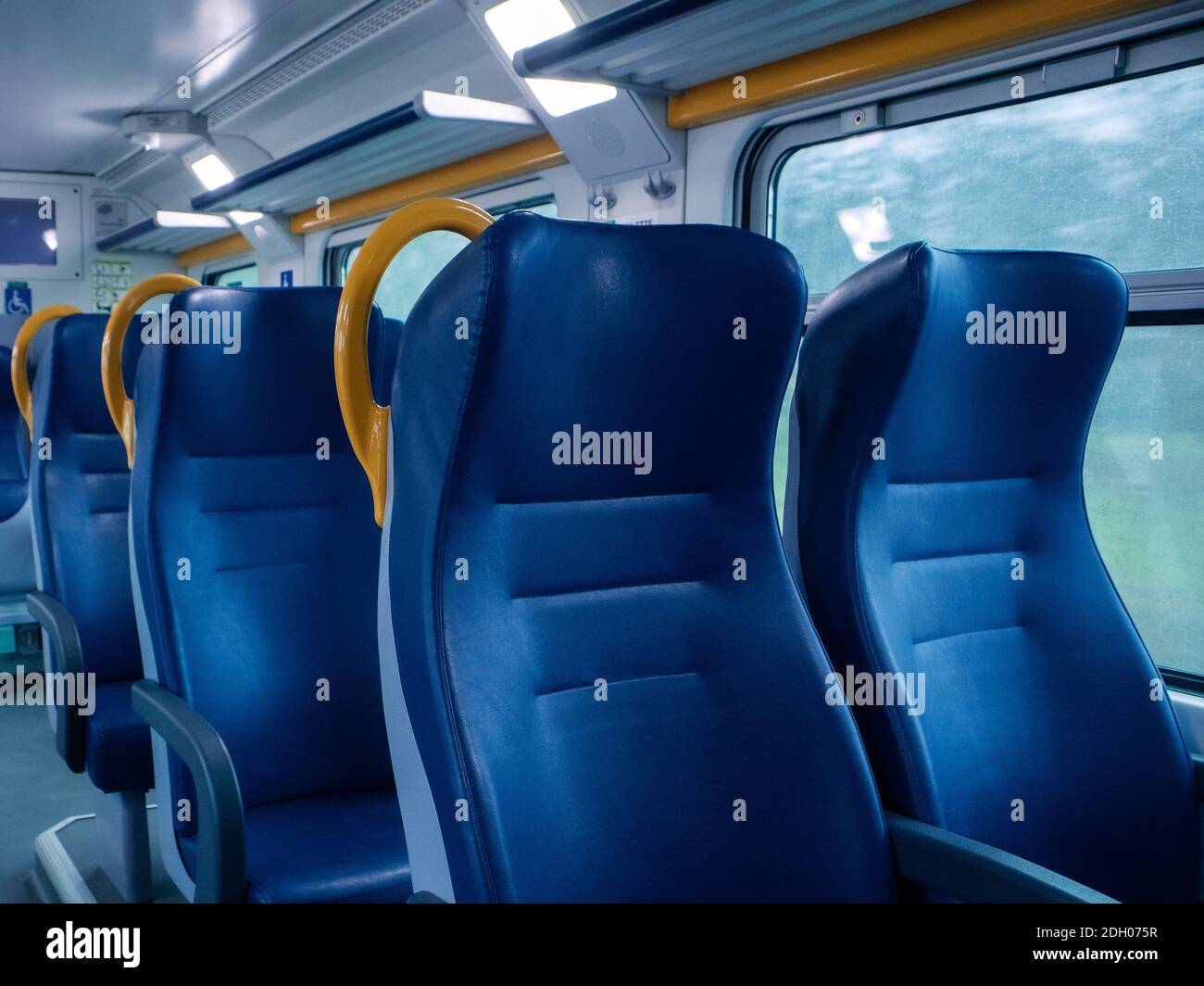 blue seats of a train coach Stock Photo - Alamy