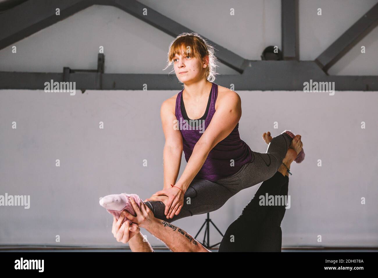 Theme sport and a healthy lifestyle. Acrobatics and acroyoga. Young ...