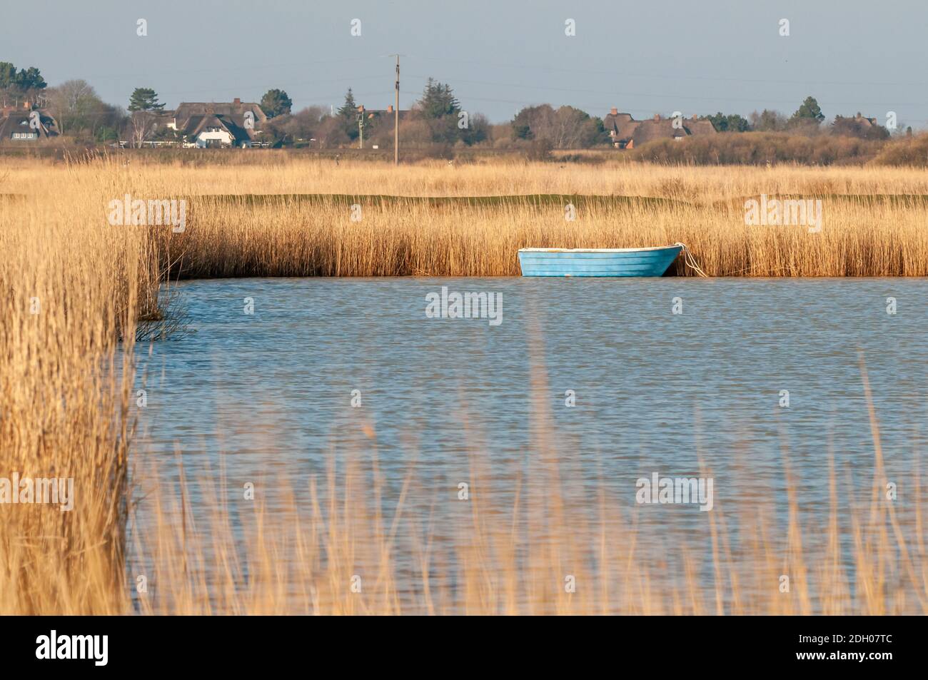 Blue rowing boat Stock Photo - Alamy