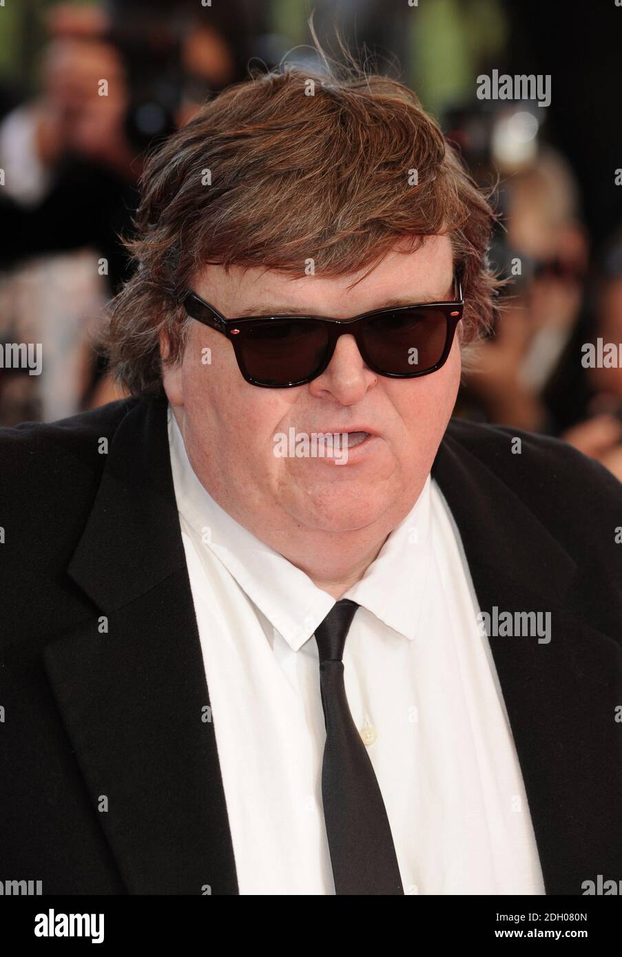 Michael Moore arrives for the premiere for Indiana Jones and the ...