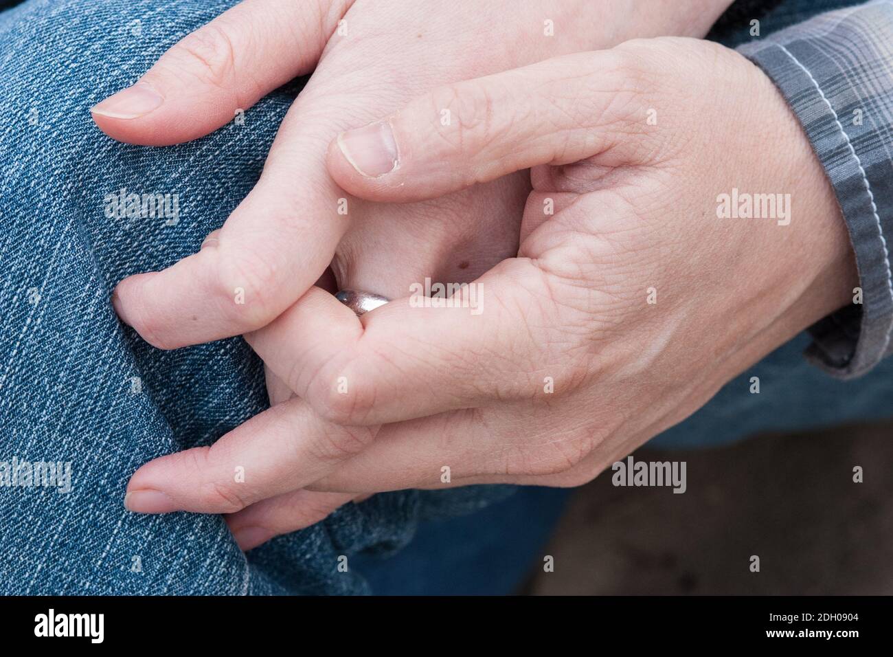 Lovers couple holding hands Stock Photo - Alamy
