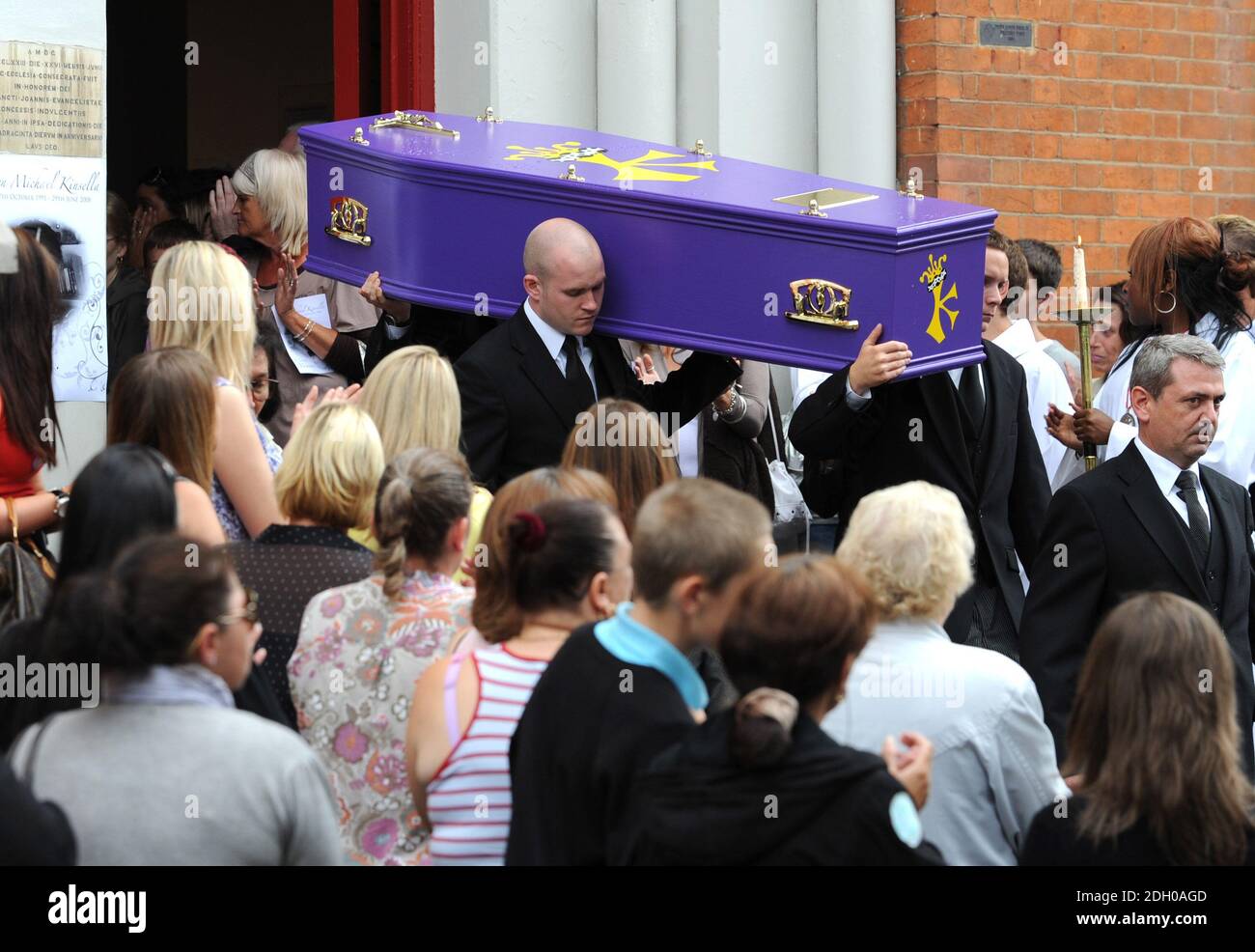 Mourners attend the funeral of Ben Kinsella at the St. John's the ...