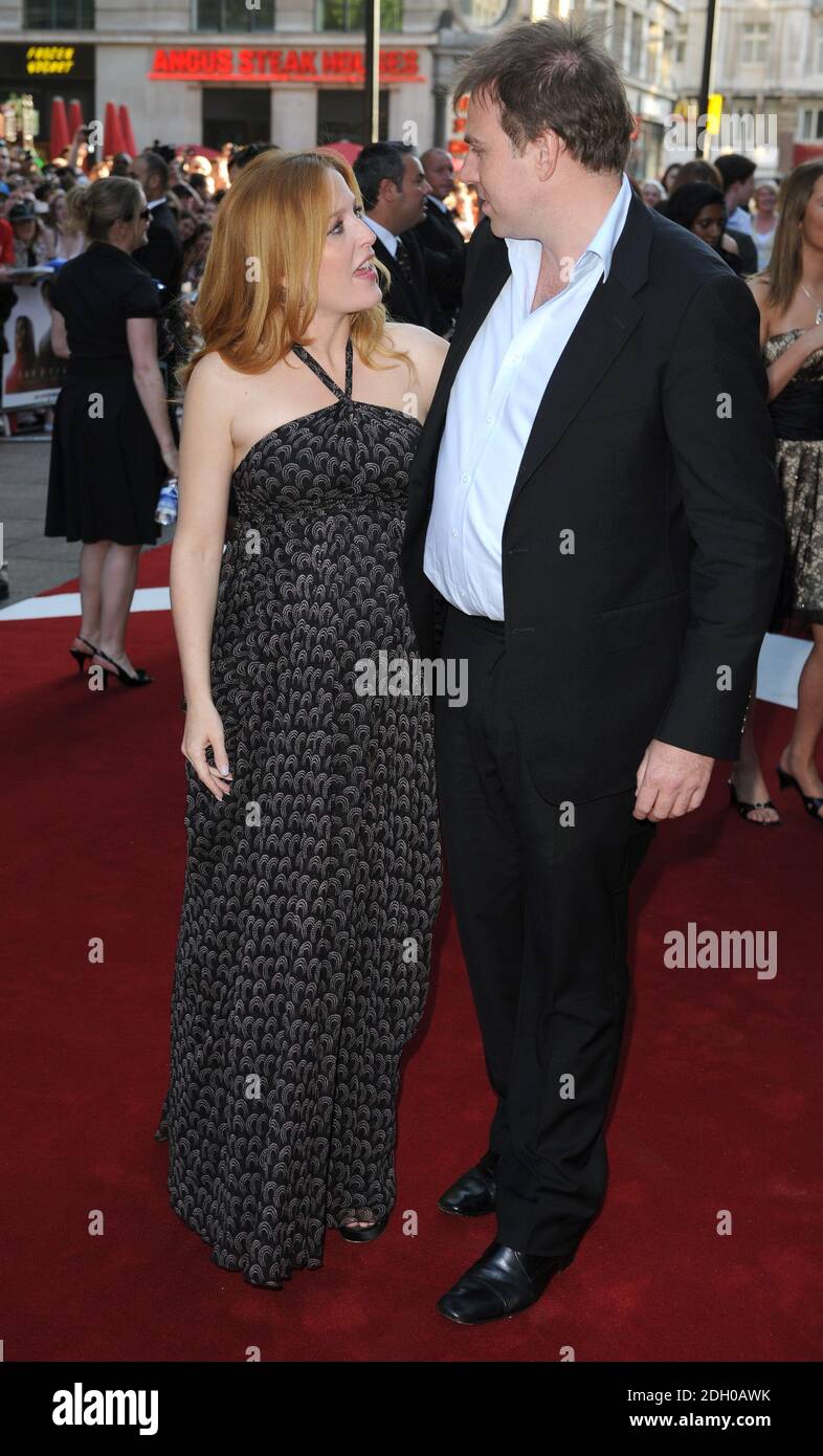 Gillian Anderson and partner Mark Griffiths arriving at the UK Film ...