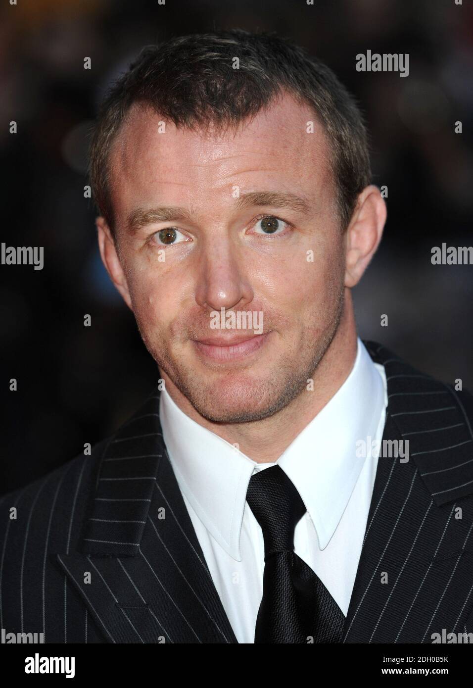 Guy Ritchie arriving at the World Premiere of RocknRolla, Odeon West ...