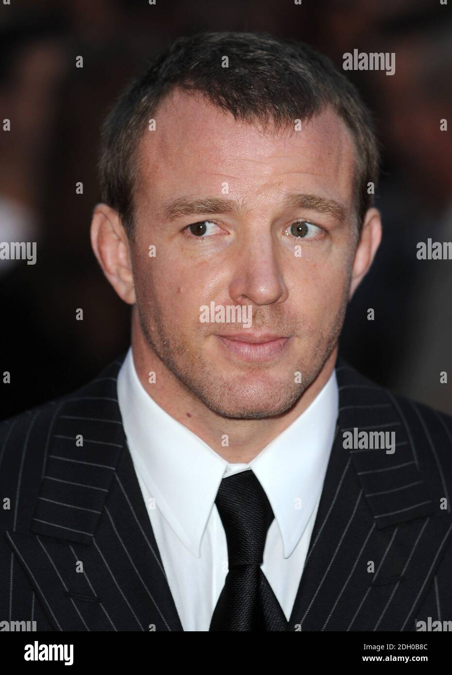 Guy Ritchie arriving at the World Premiere of RocknRolla, Odeon West ...
