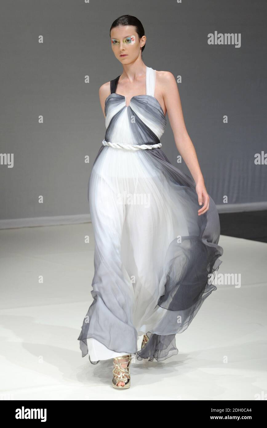 A model wears a creation by Ashley Isham, during London Fashion Week at ...