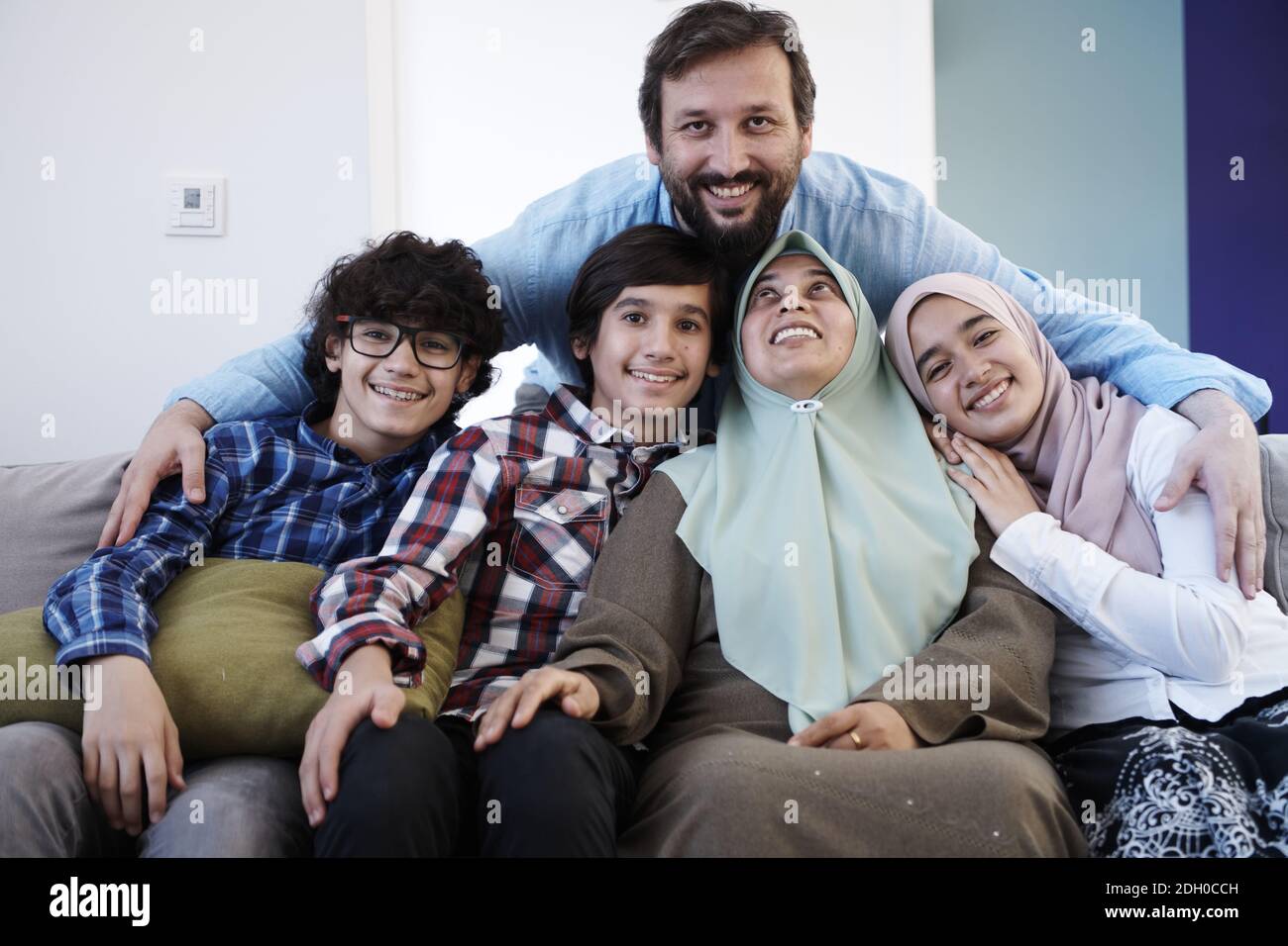 Muslim family portrait at home Stock Photo - Alamy