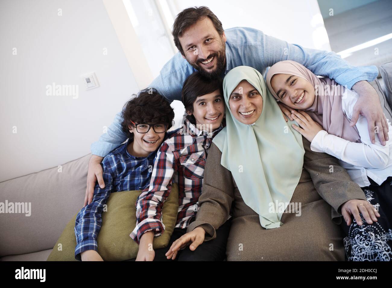 Muslim family portrait at home Stock Photo - Alamy