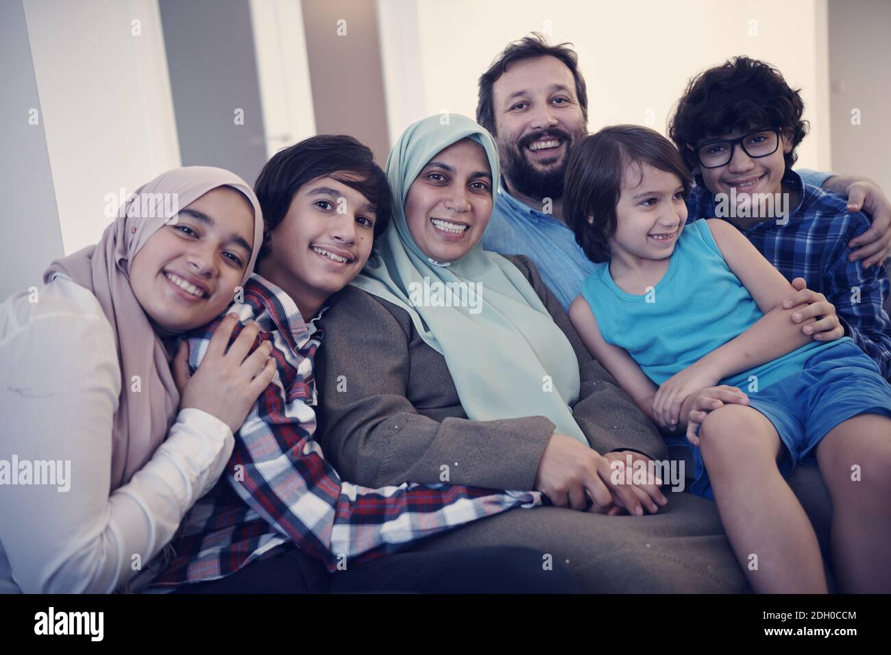 Muslim family portrait at home Stock Photo - Alamy