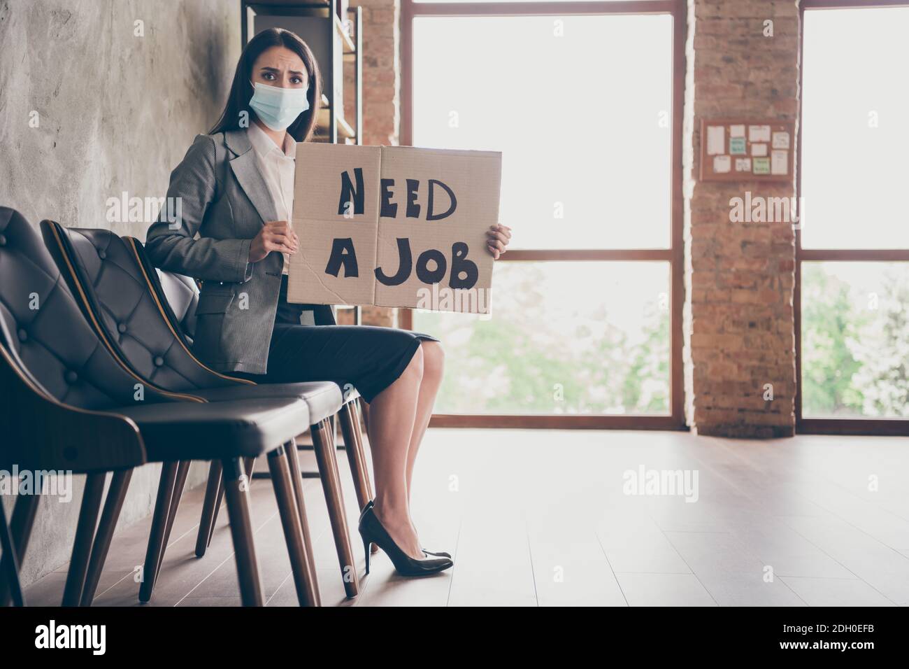 Full length profile side photo of scared girl marketer agent sit chair ...