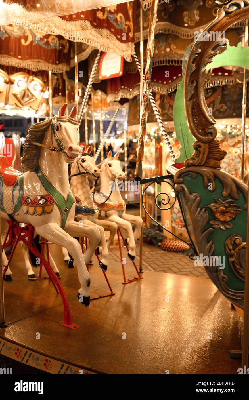 Festive carousel in a holiday park. Merry-go-round with horses Stock ...