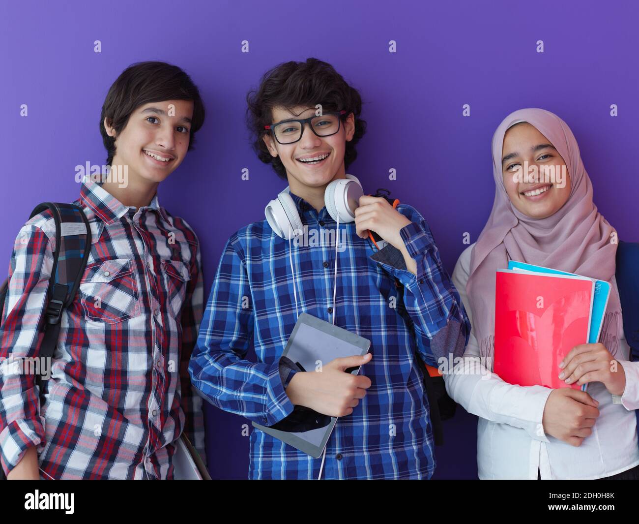 Arab teenagers group working on laptop computer together Stock Photo ...