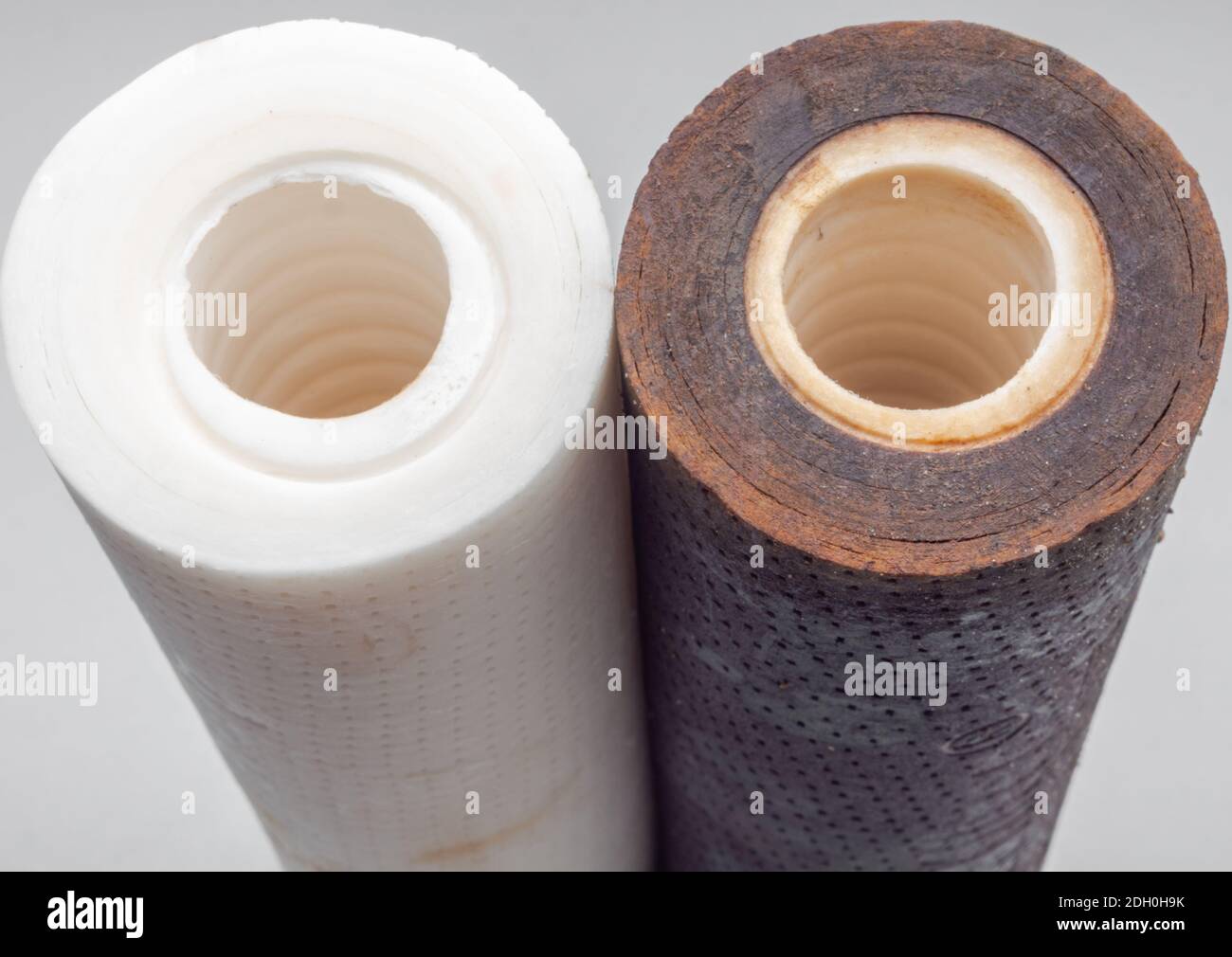 Water filter cartridges new and used with rusty brown coloring. Clean ...