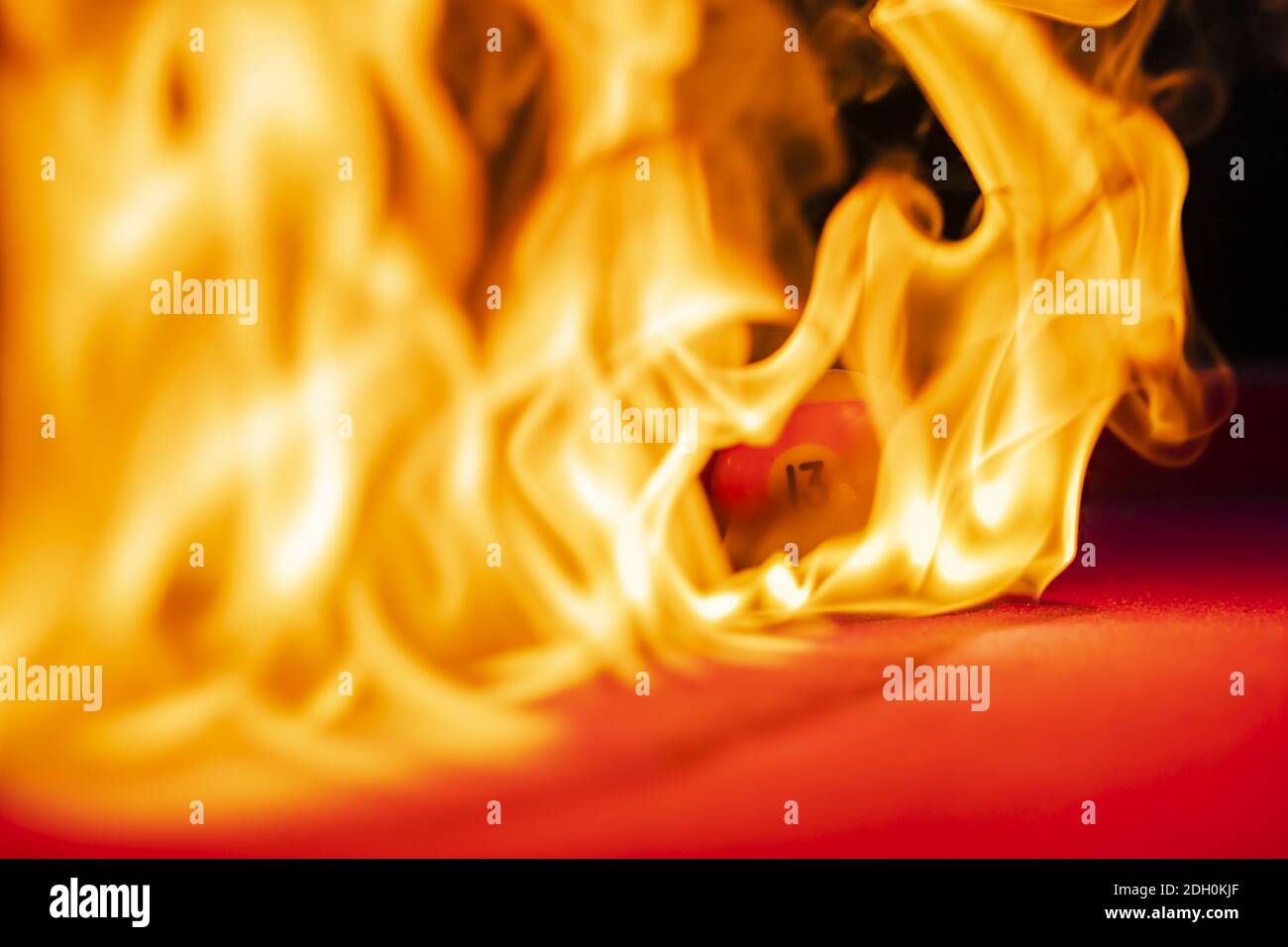 Pool Balls Are Lit On Fire While Sitting On A Pool Table In An Outdoor ...