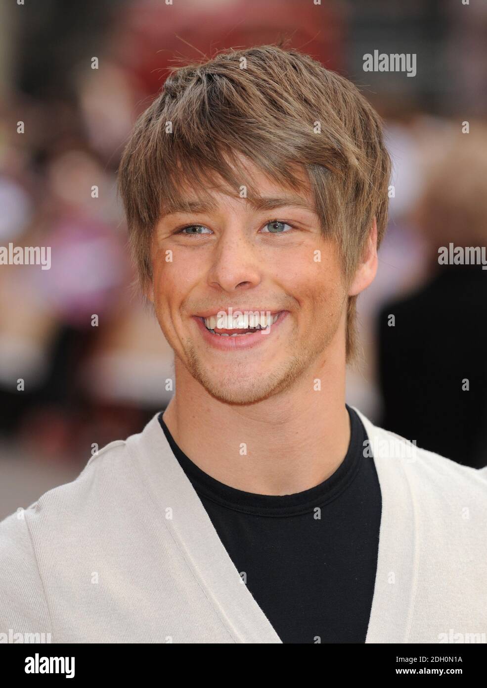 Mitch Hewer arriving at the UK Film Premiere of 'Hannah Montana' at the ...