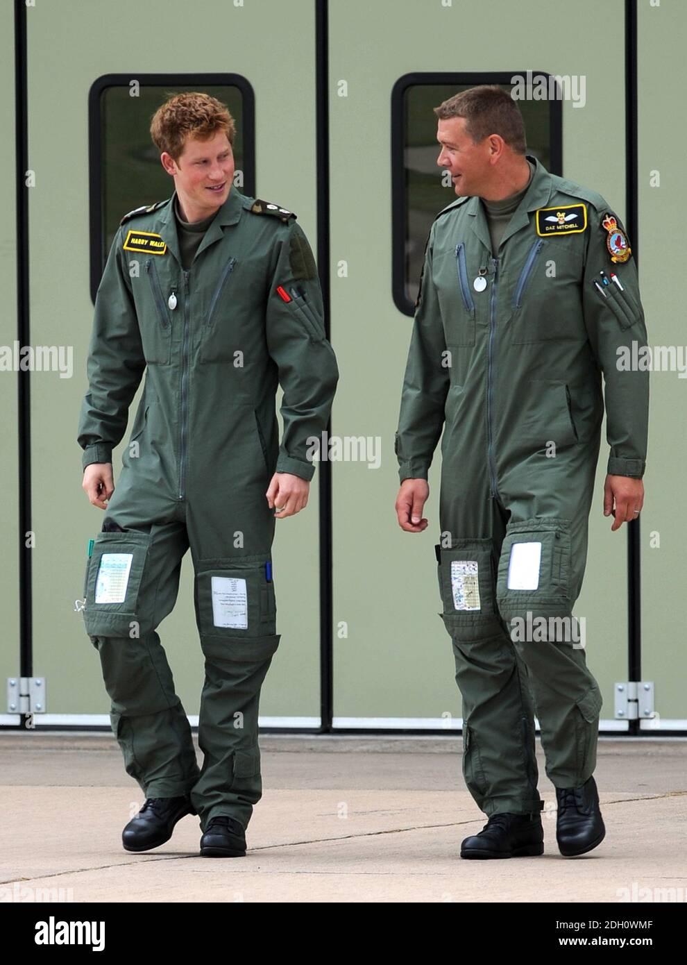 Prince Harry with instructor Daz Mitchell during a photocall at their ...