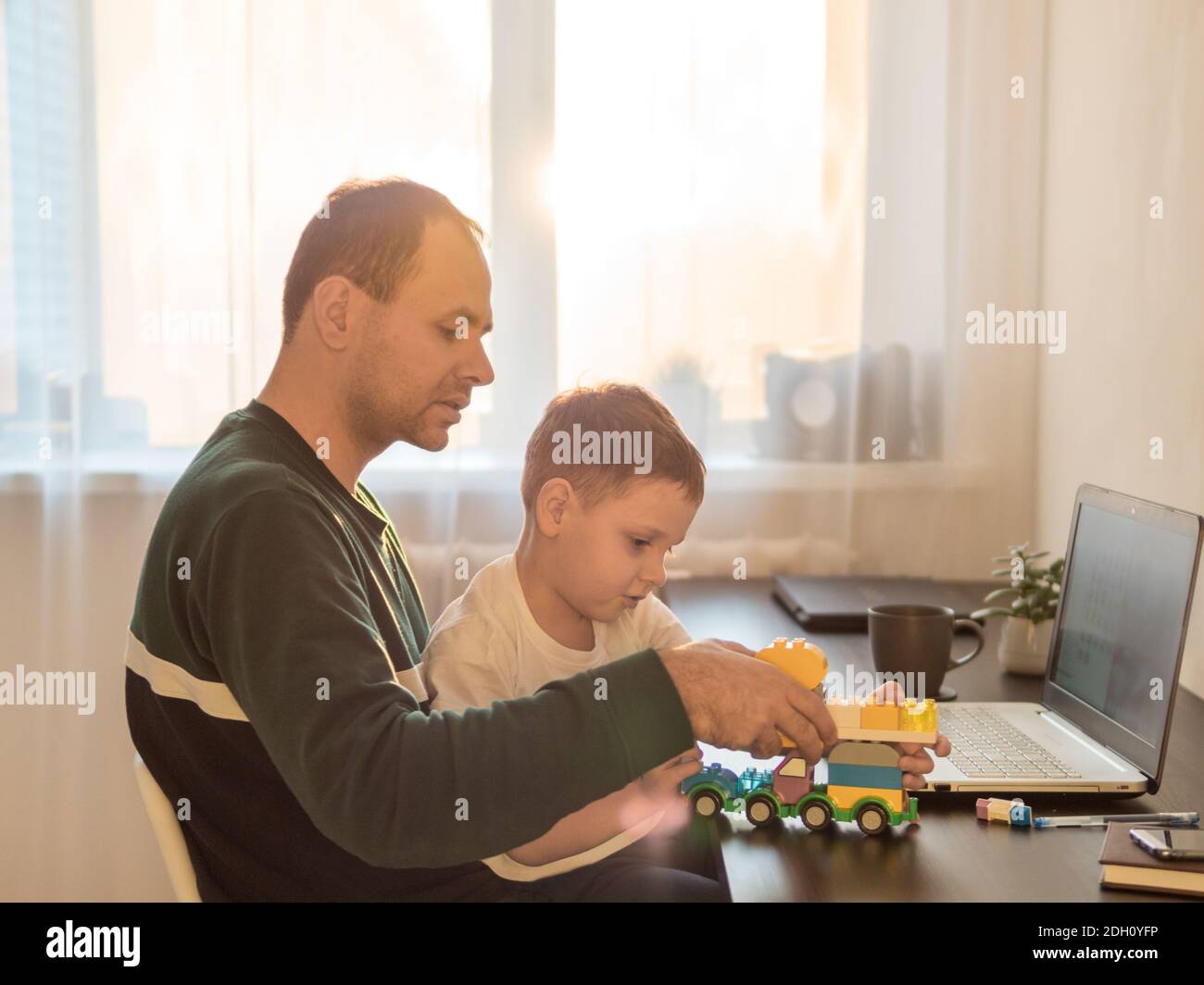 Working among children hi-res stock photography and images - Alamy