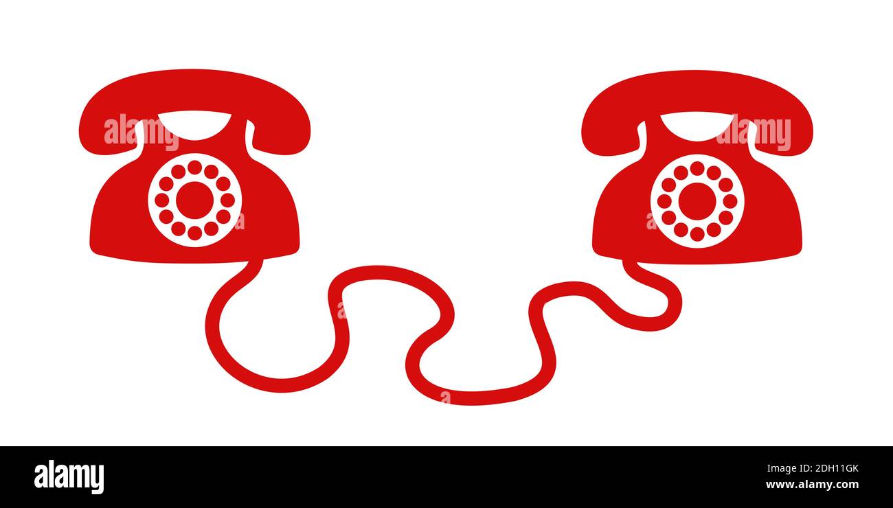 Hotline - two old vintage retro red phones are connected for emergency ...