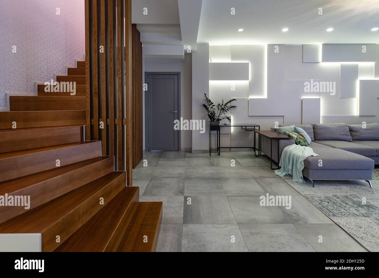 Modern interior of luxury studio apartment. Hi-tech design of wall with ...