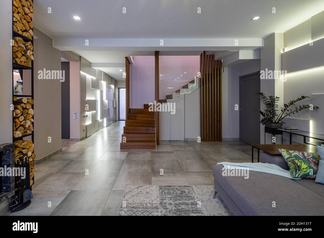 Modern interior of luxury studio flat. Home design. Wooden staircase ...