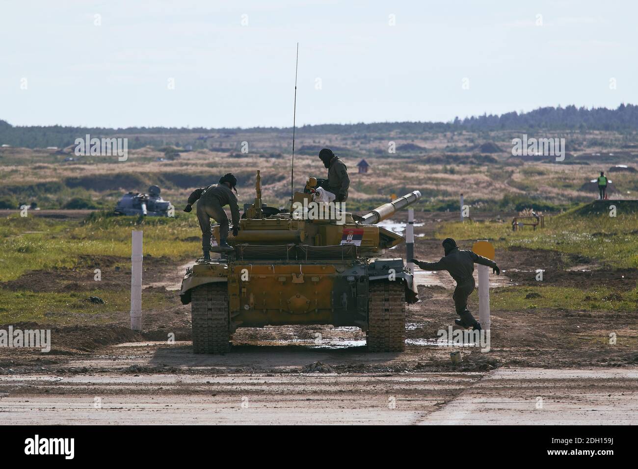 The crew of a Serbian tank preparing for battle during the competition ...