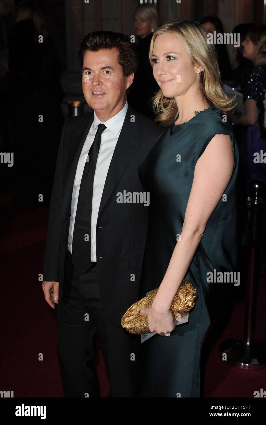 Simon Fuller and wife Natalie Swanston arrive for the British Fashion ...