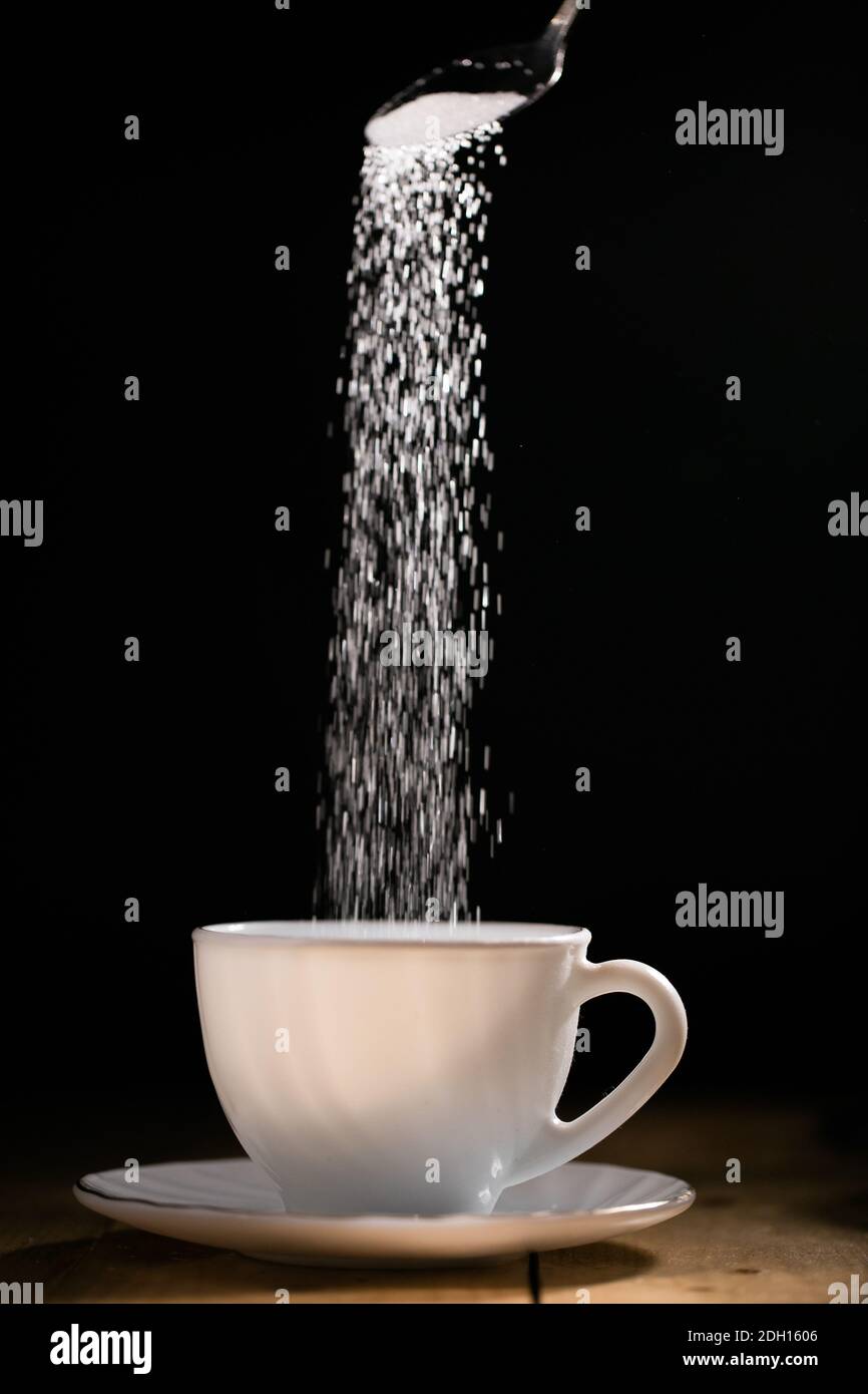 Pouring sugar hi-res stock photography and images - Alamy
