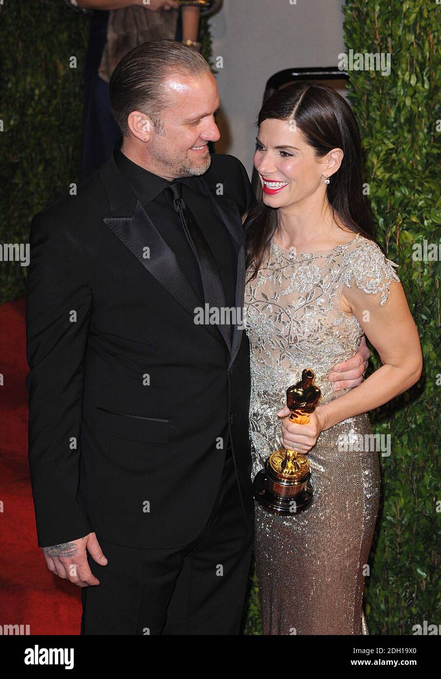 Actress Sandra Bullock and husband Jesse James arriving at the Vanity ...