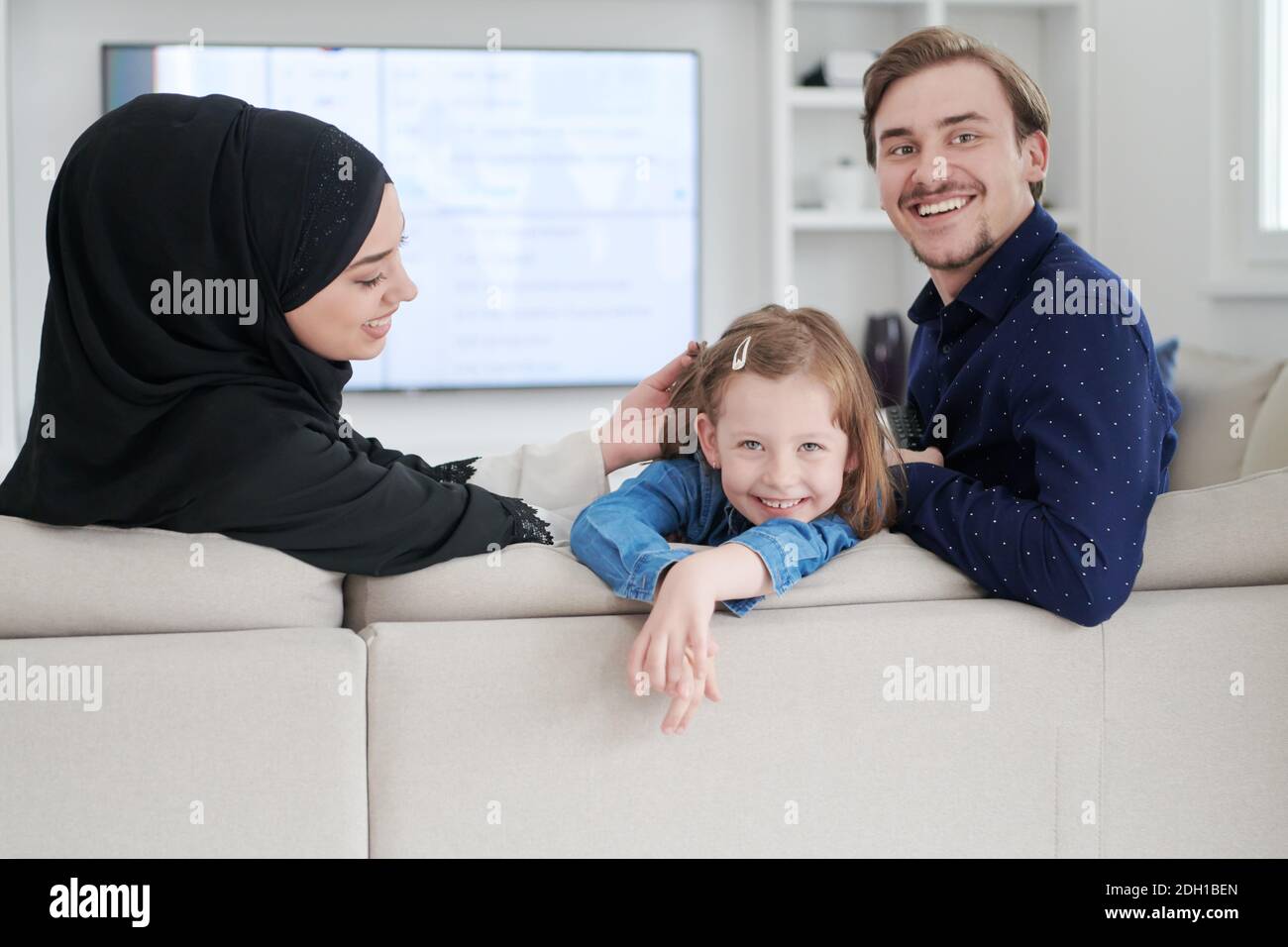 Happy Muslim family having fun at home Stock Photo - Alamy