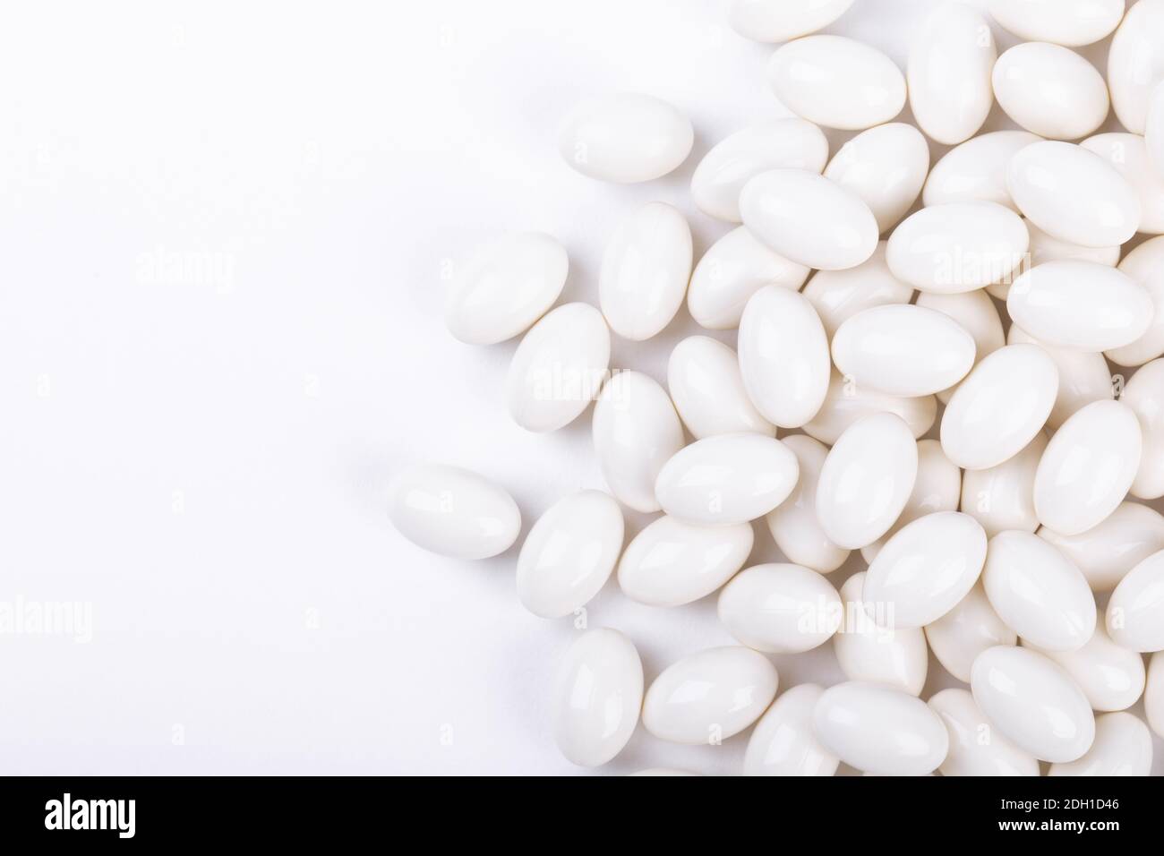 A top view of white round tablets isolated on white background Stock ...