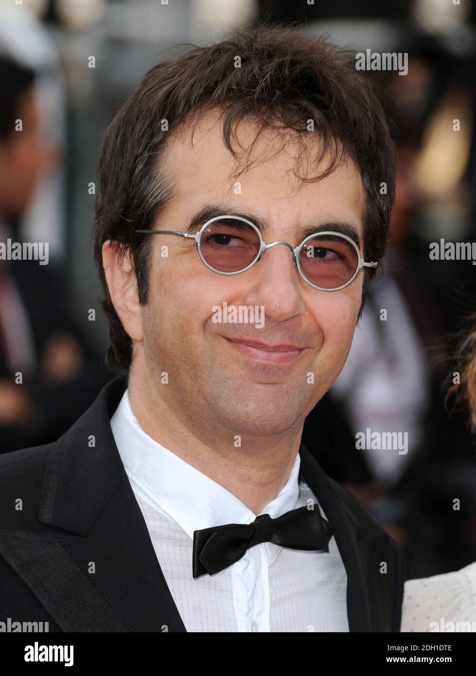 Atom Egoyan arrives for the premiere of Poetry at the Grand Auditorium ...