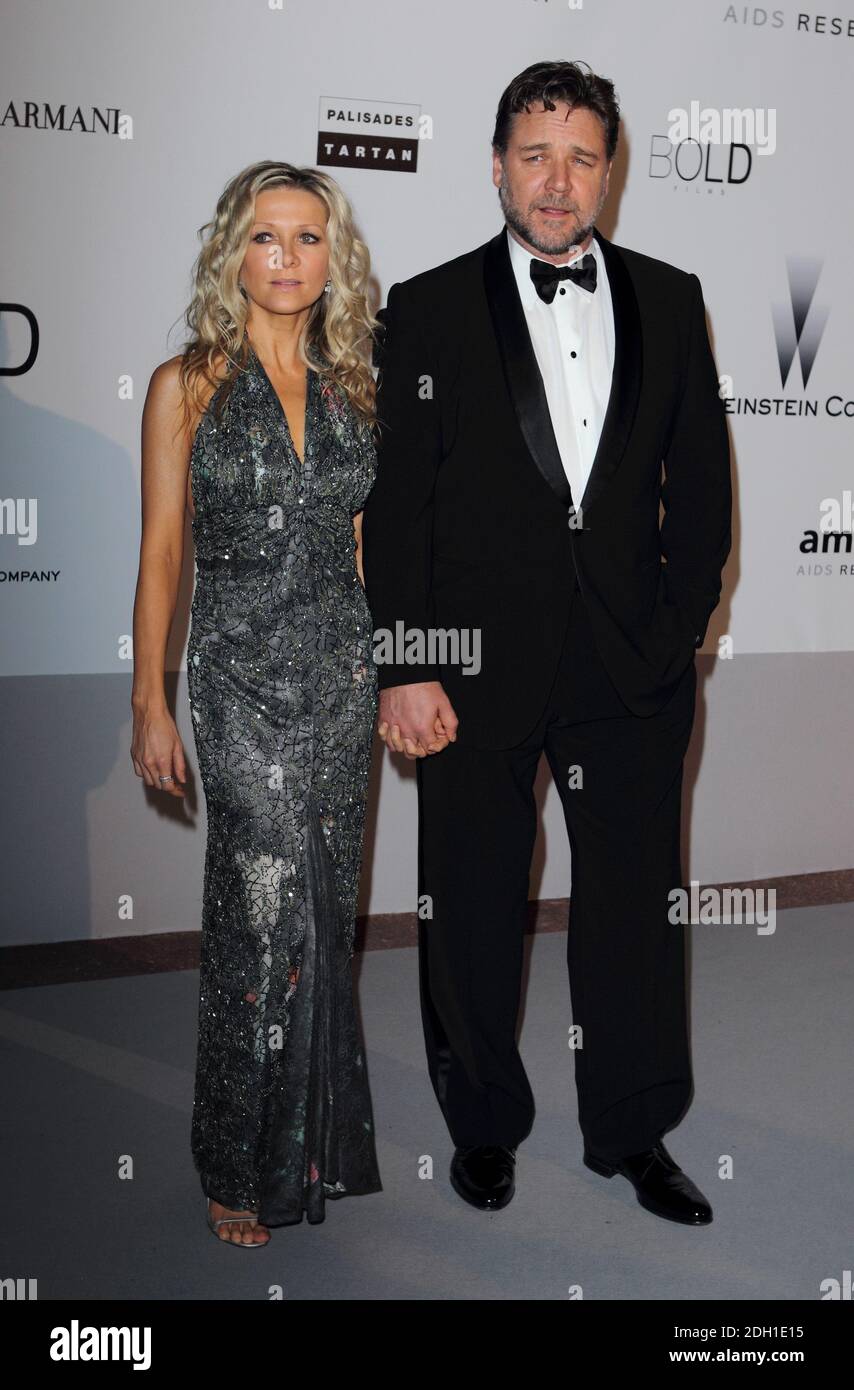 Russell Crowe and wife arriving at the amFAR Gala at the Hotel du Cap ...