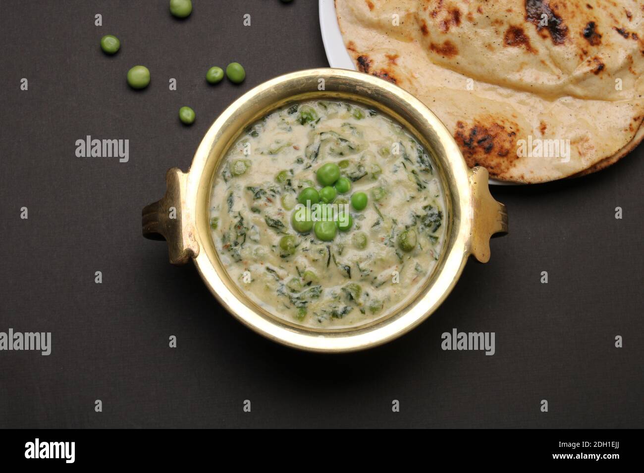 Methi Mutter Malai, Indian food server with naan or tandoori roti Stock ...