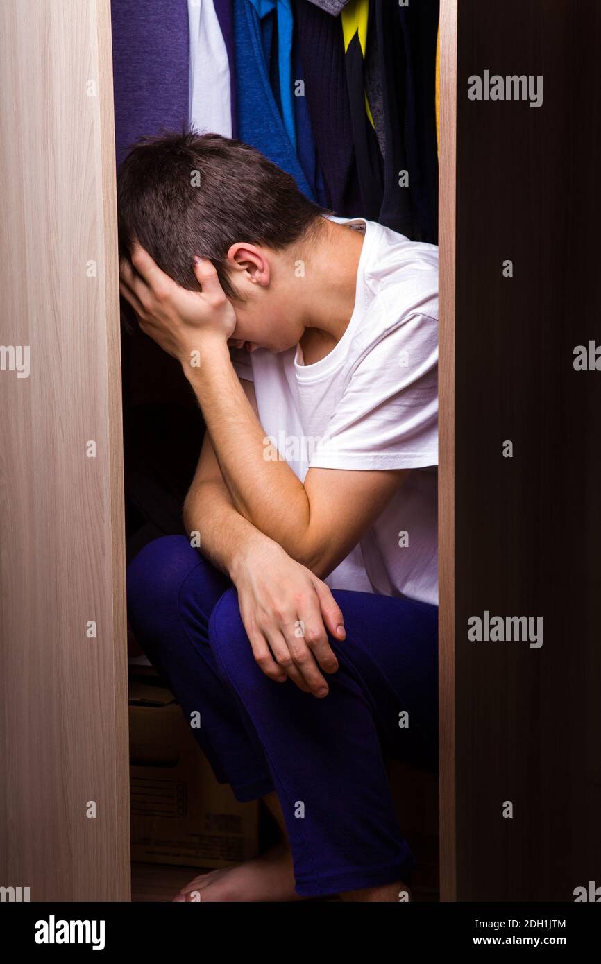 Man hide wardrobe hi-res stock photography and images - Alamy