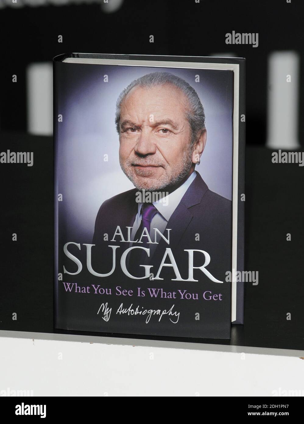 Lord Alan Sugar signs copies of his Autobiography 'What You see Is What ...