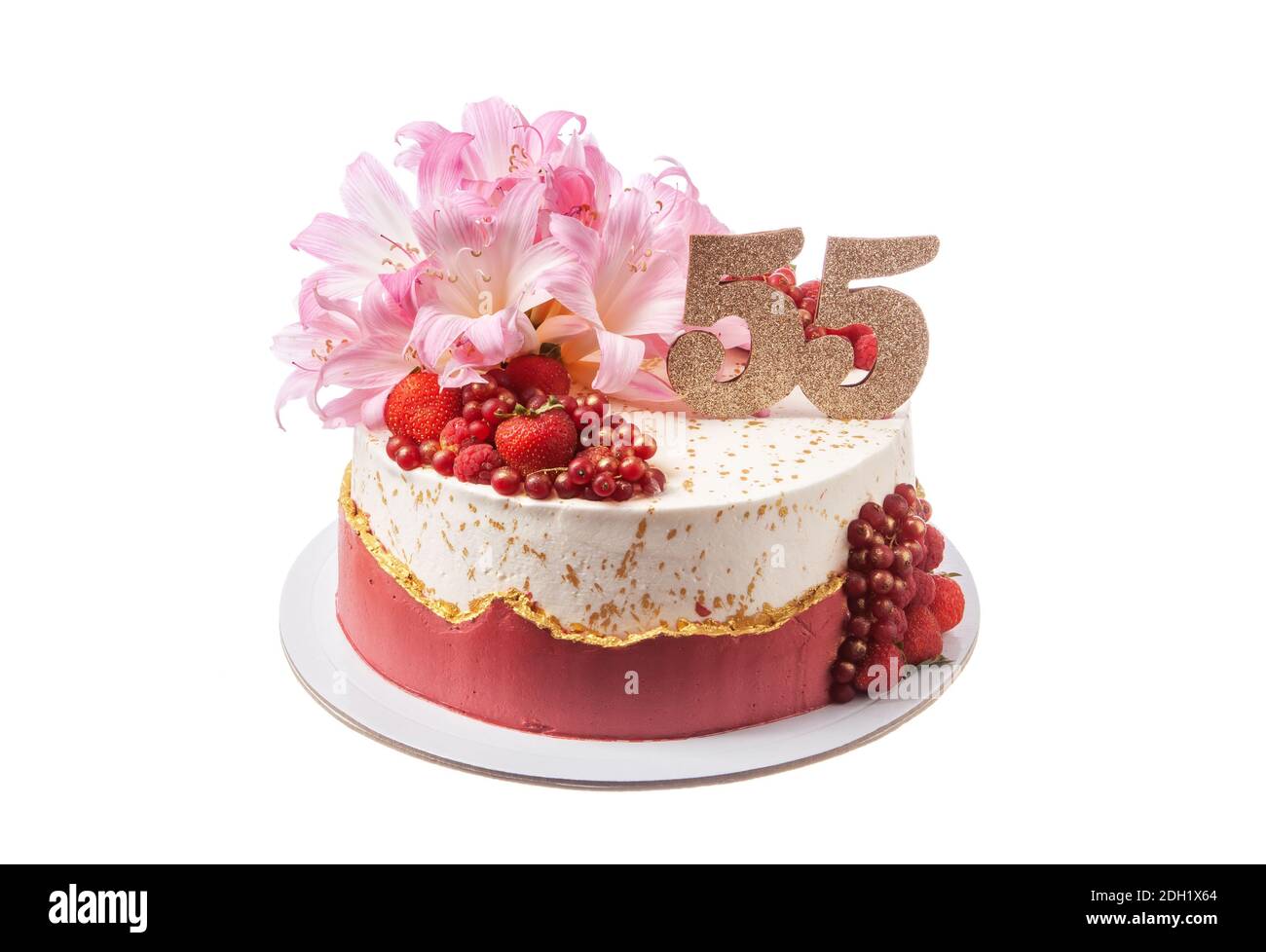 Beautifully decorated red birthday cake. The number is fifty five ...