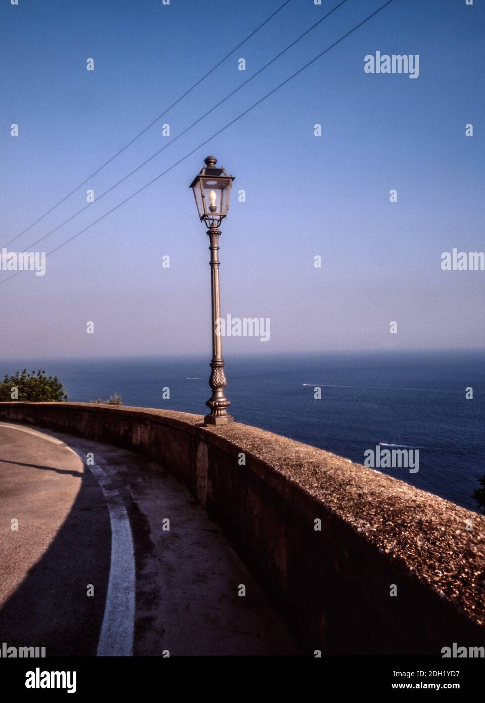 Lamp post by the sea Stock Photo - Alamy