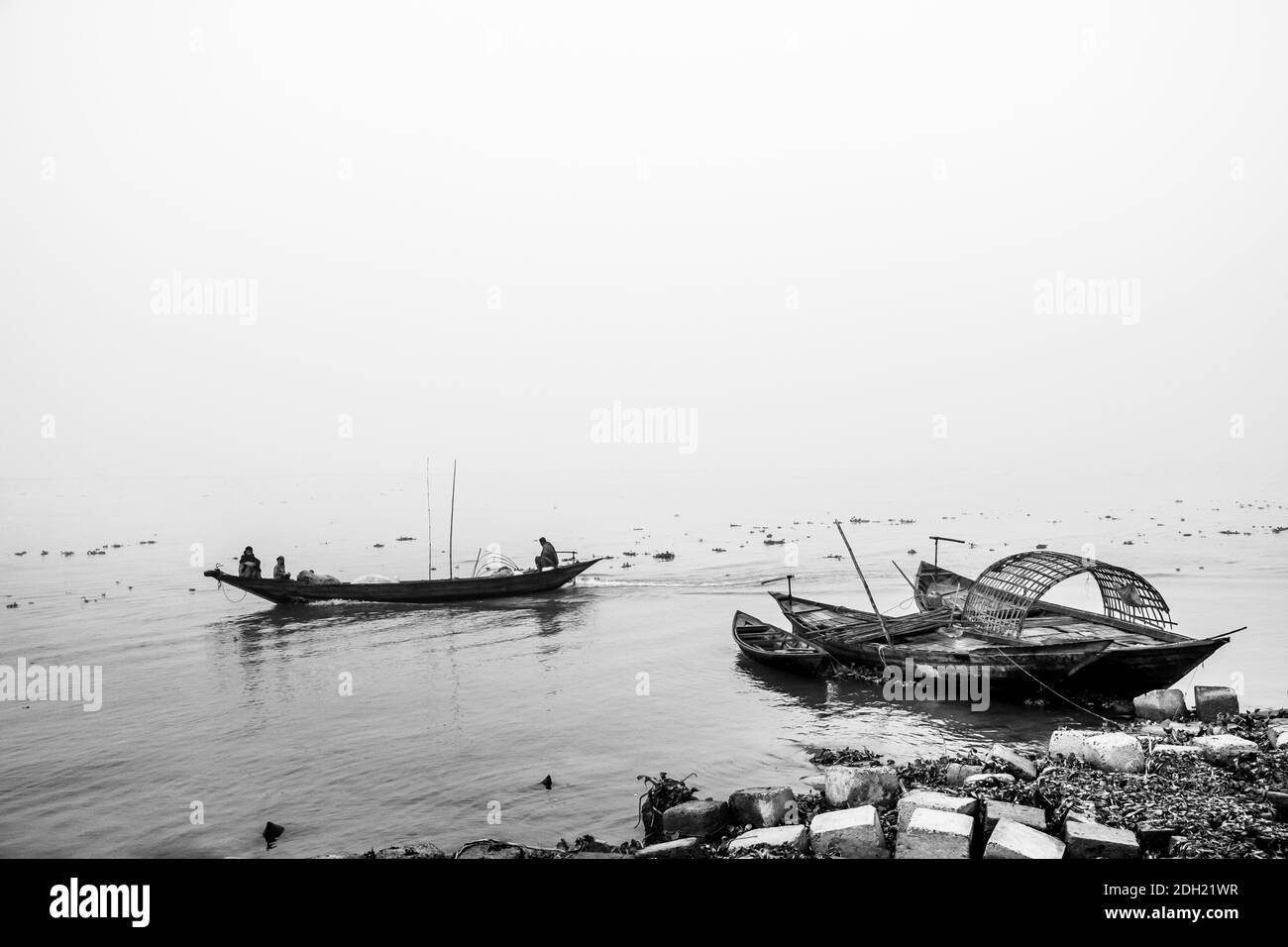 Traditional fishing boat in the riverbank captured from Chandpur ...