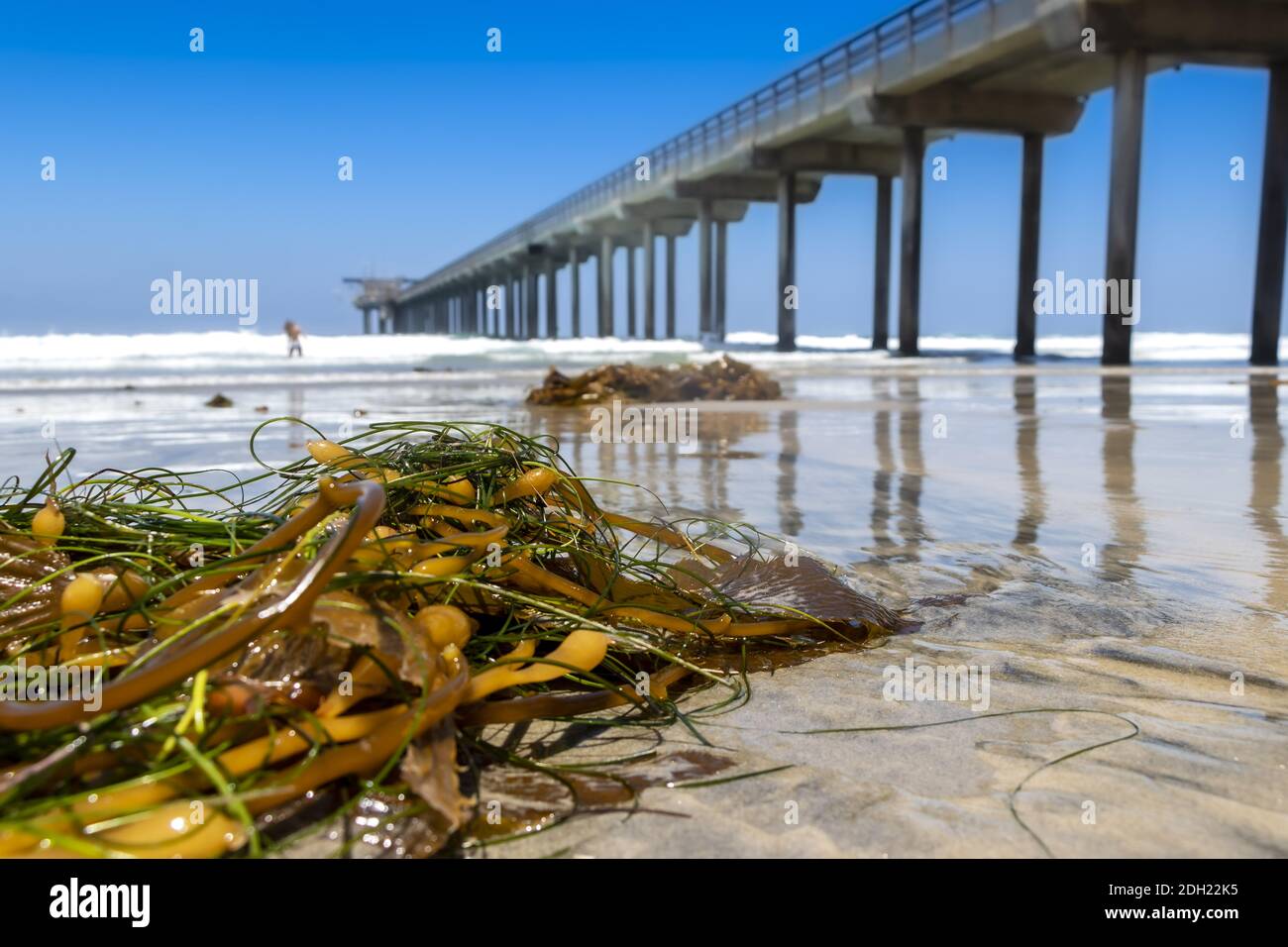 View Of A Pier With Waves Crashing Into The Structure Stock Photo - Alamy