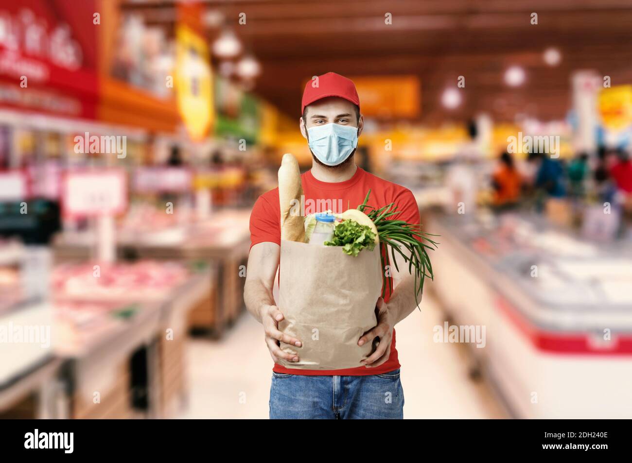 Delivery company worker holding grocery box, food order, supermarket ...