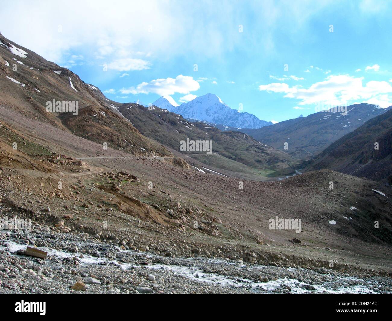 Alpine road winding through the Himalayan mountains in the Spiti valley ...
