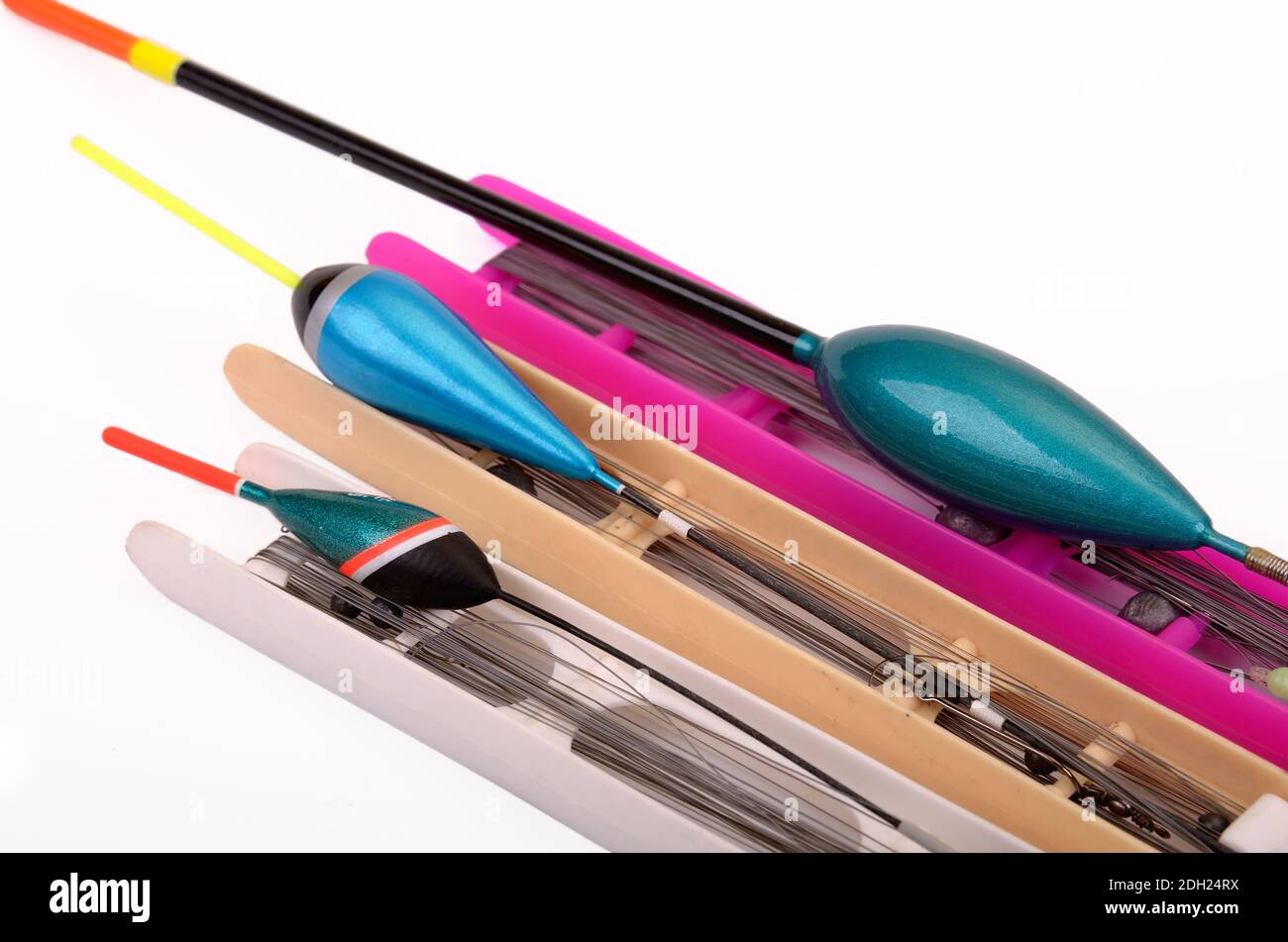 fishing rod with a float isolated on white background Stock Photo - Alamy