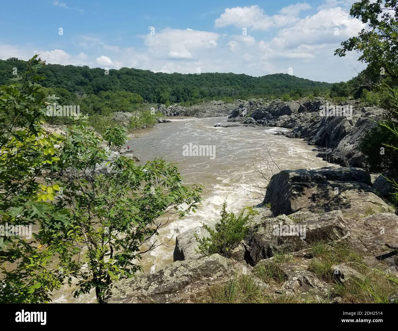 The Potomac river rapids swollen by heavy rains, at the Great Falls, in ...