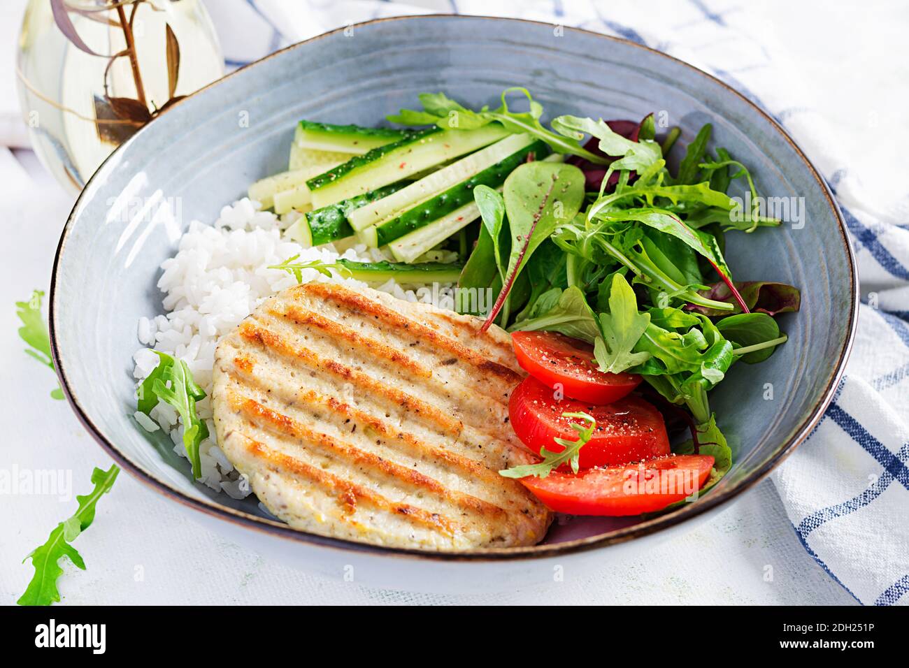Chicken schnitzel or cutlet, poultry meat grilled and boiled white rice ...